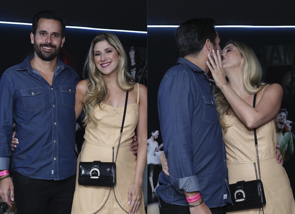 Recém-casados, Dani Calabresa e marido beijam muito em show de Luan Santana