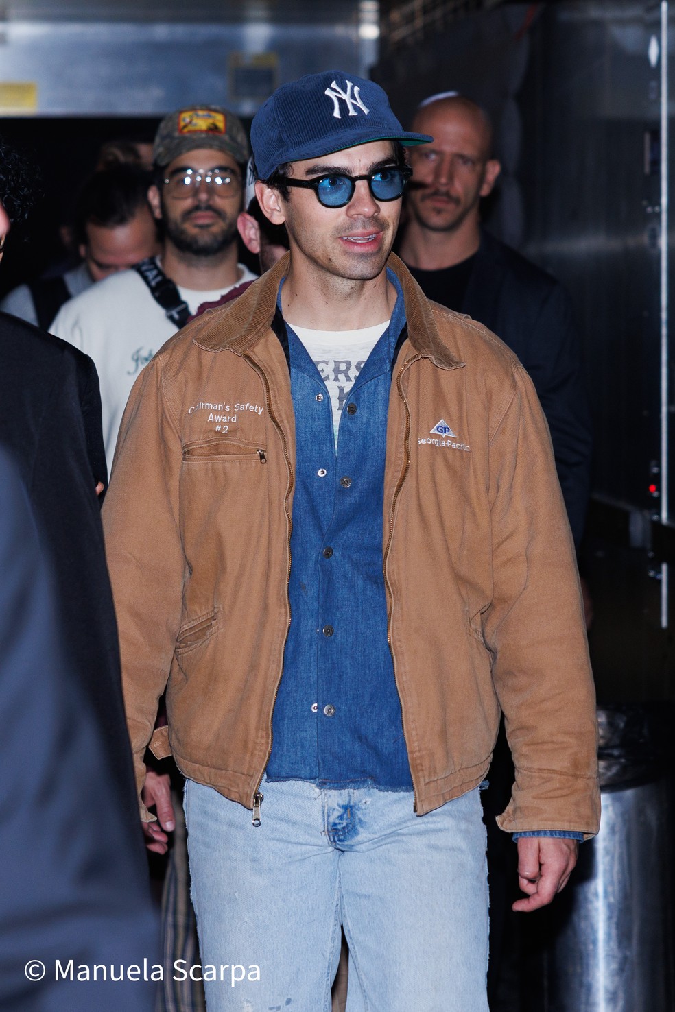 Nick, Joe e Kevin Jonas, da banda Jonas Brothers, desembarcam em São Paulo