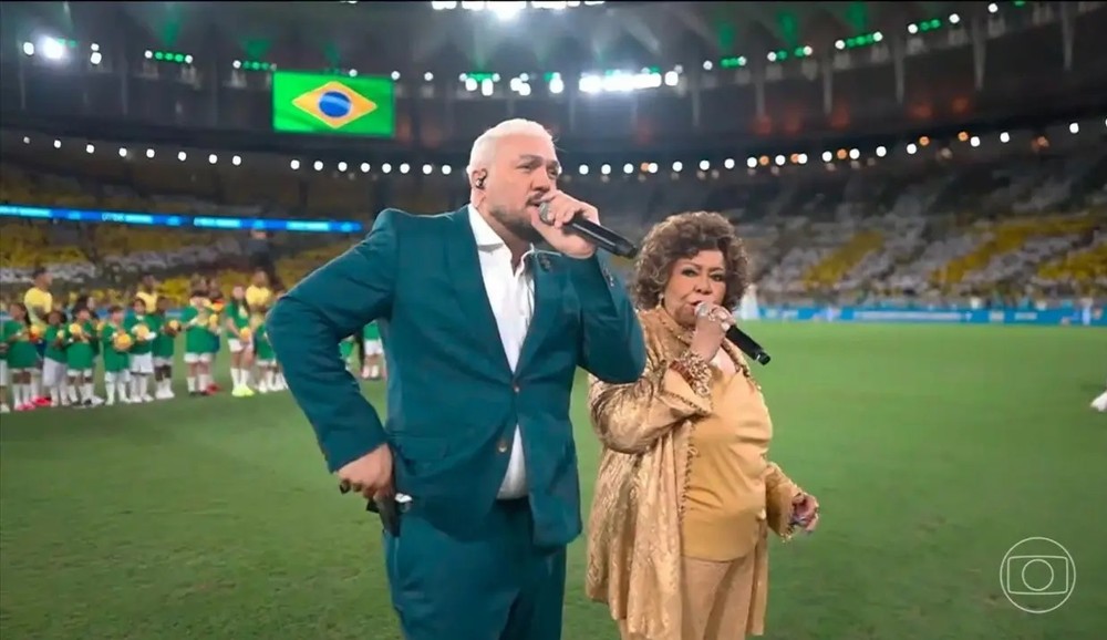 Após críticas ao cantar Hino Nacional, Belo diverte público ao fazer ...